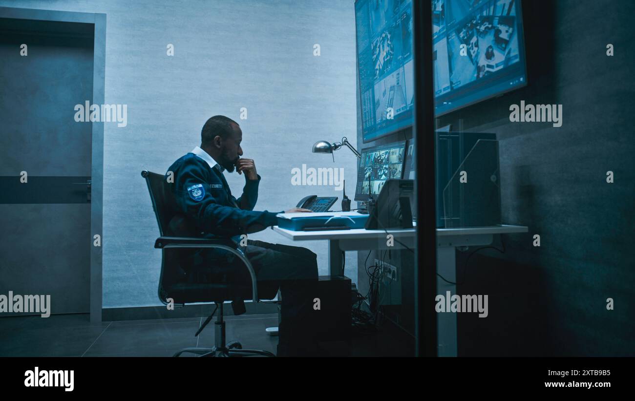 African american employee using cctv hi-res stock photography and ...