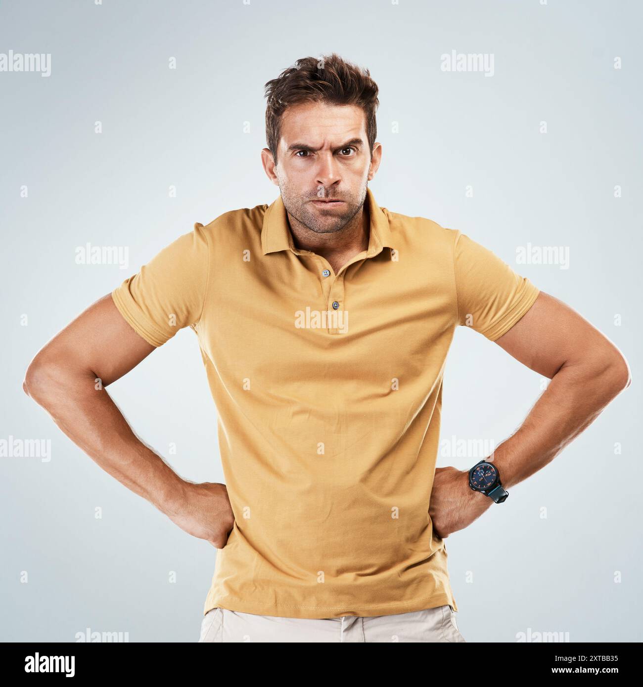 Man, angry and portrait in studio with white background for conflict ...