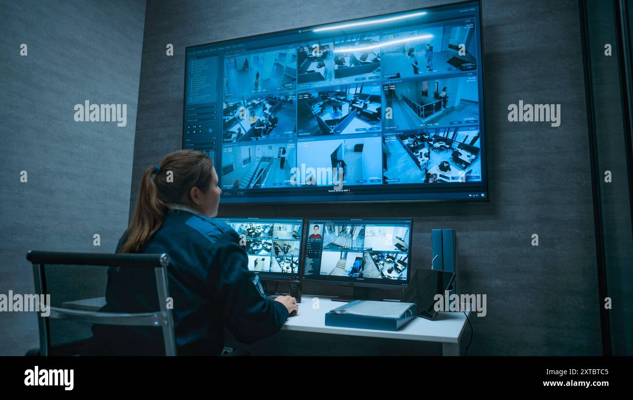 Female Cctv Operator Controls Office Surveillance Cameras With Face Recognition Using Computer