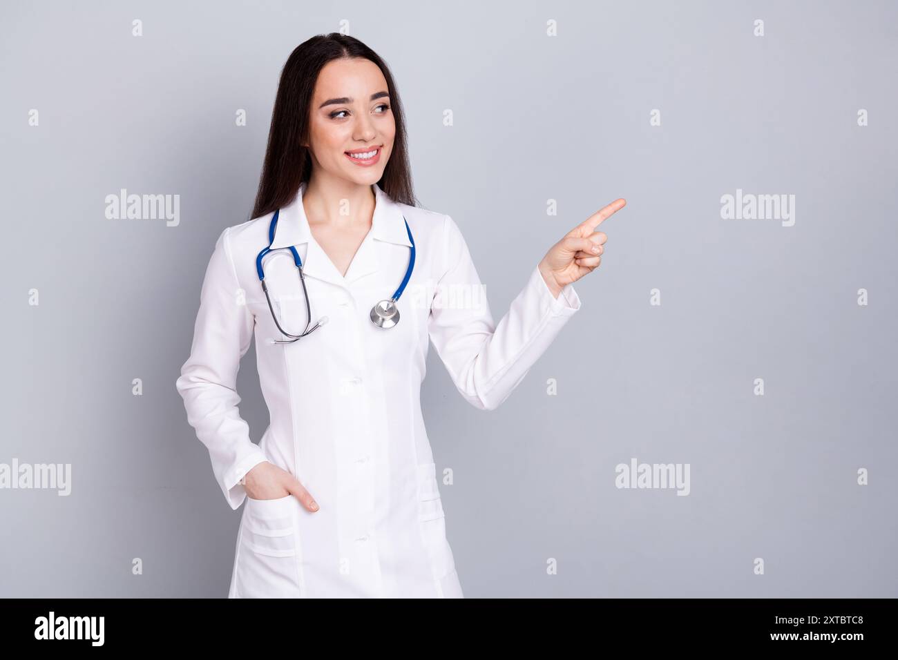 Photo of professional medical worker lady point finger empty space ...