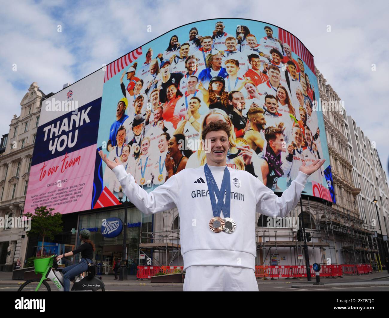 Diver Noah Williams poses with his Olympic medals in front of the ...