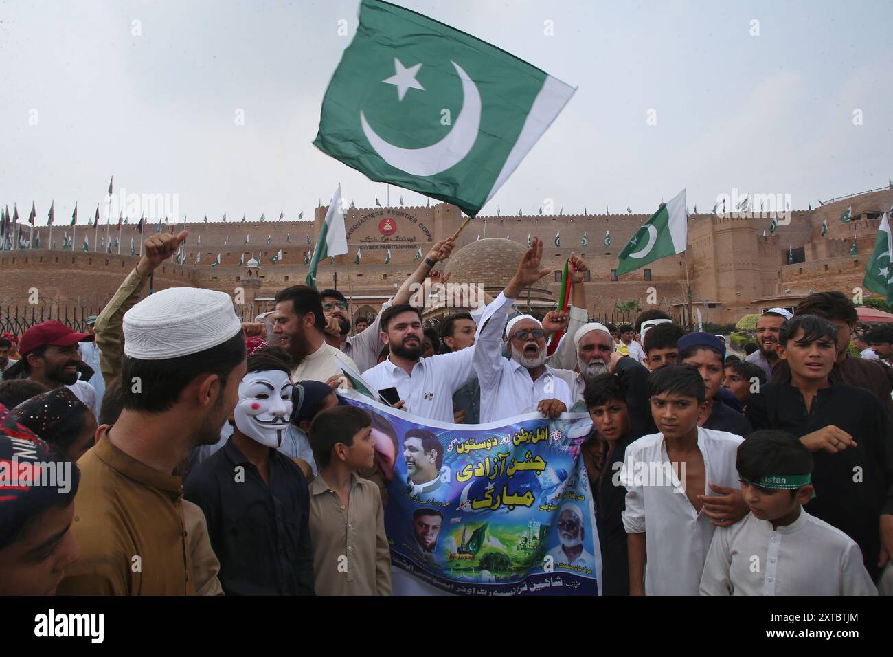 People wave national flag and shout slogans to celebrate the country's ...