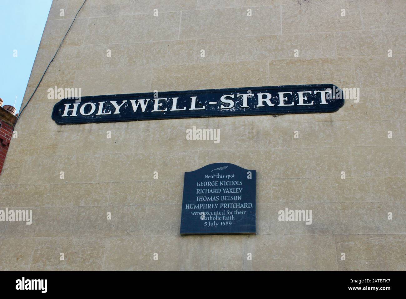holywell street sign in oxford city with plaque commemorating the ...