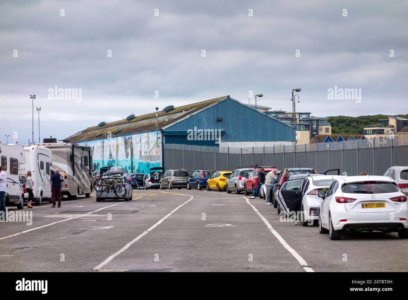 Passengers queue board ferry hi-res stock photography and images - Alamy