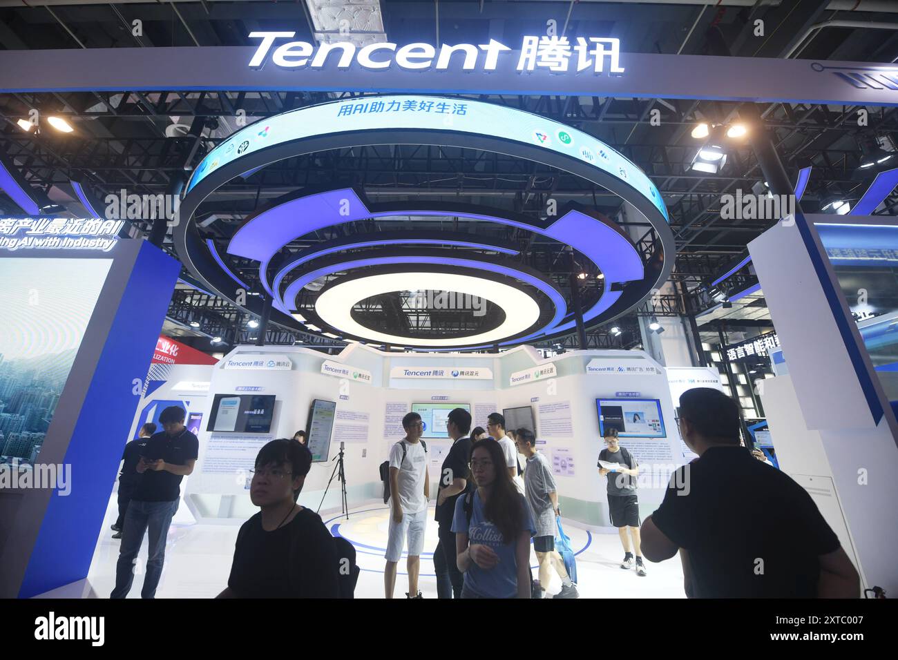SHANGHAI, CHINA - JULY 4, 2024 - Visitors visit the stand of Tencent at ...
