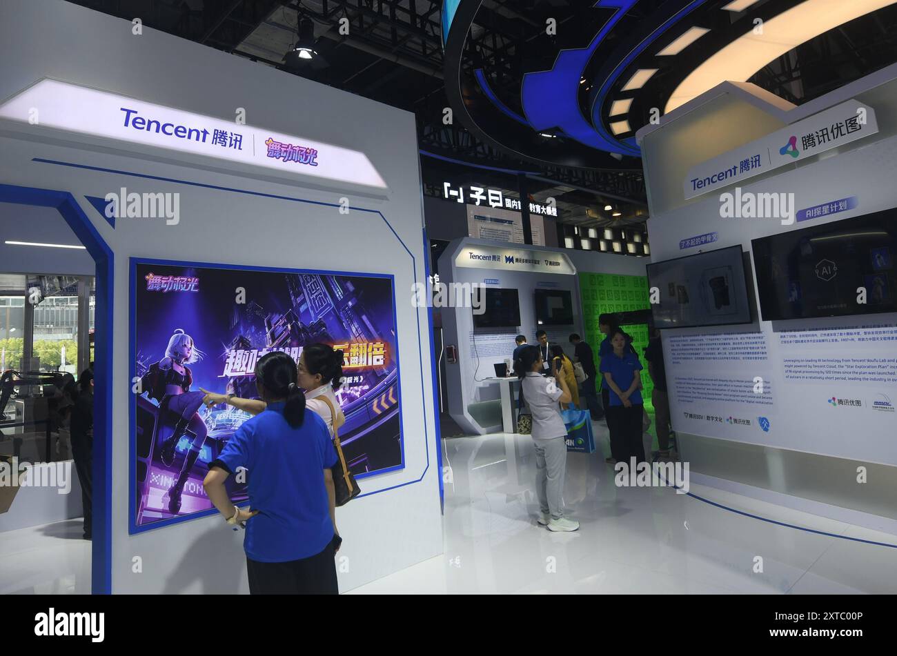 SHANGHAI, CHINA - JULY 4, 2024 - Visitors visit the stand of Tencent at ...