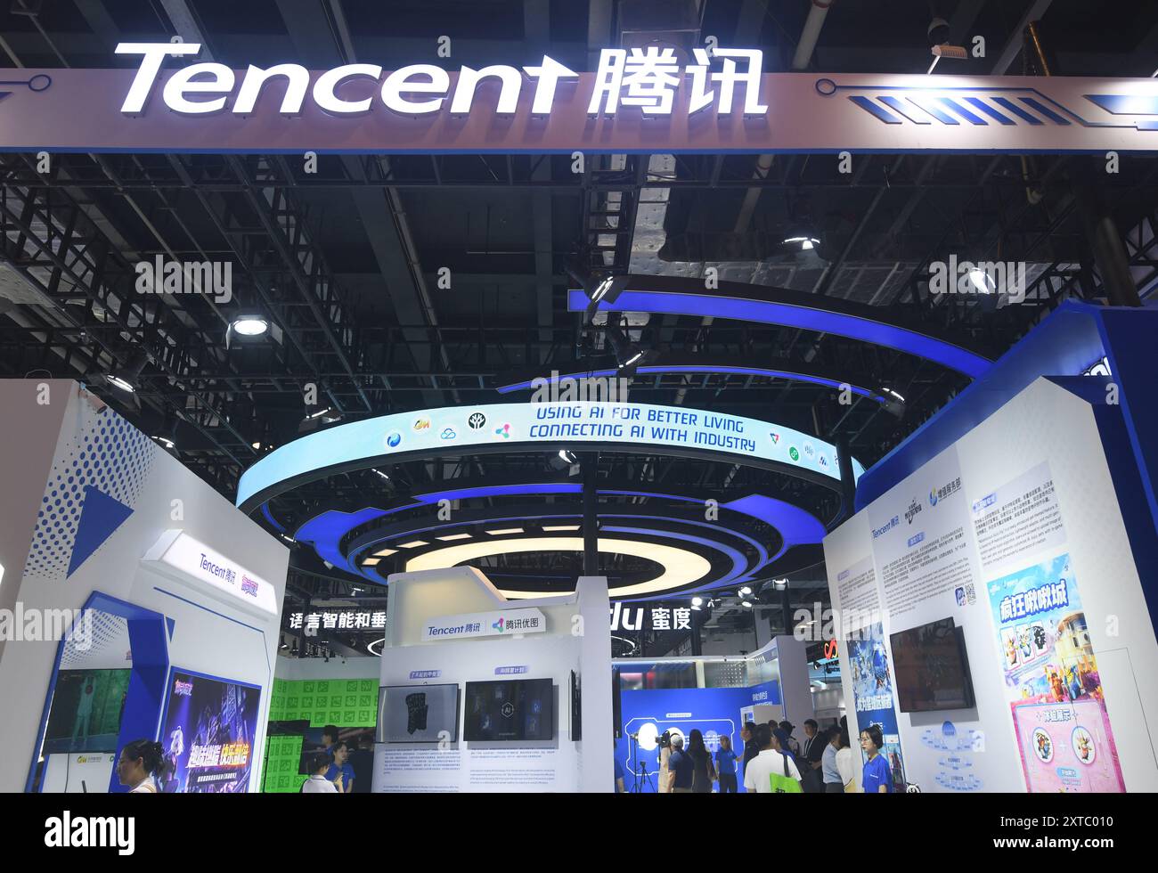 SHANGHAI, CHINA - JULY 4, 2024 - Visitors visit the stand of Tencent at ...