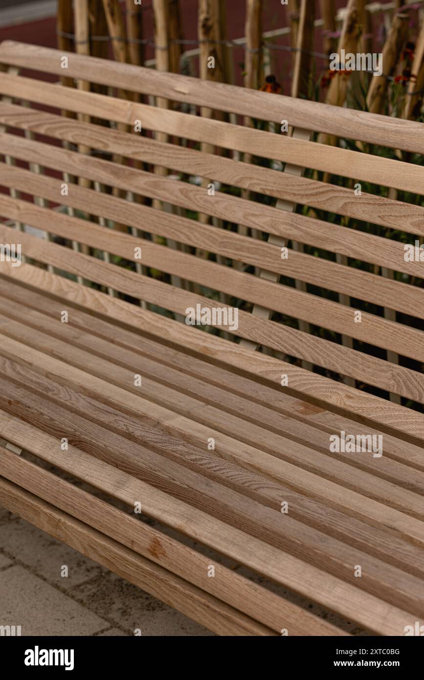Modern benches in the city square on a sunny day. City improvement ...