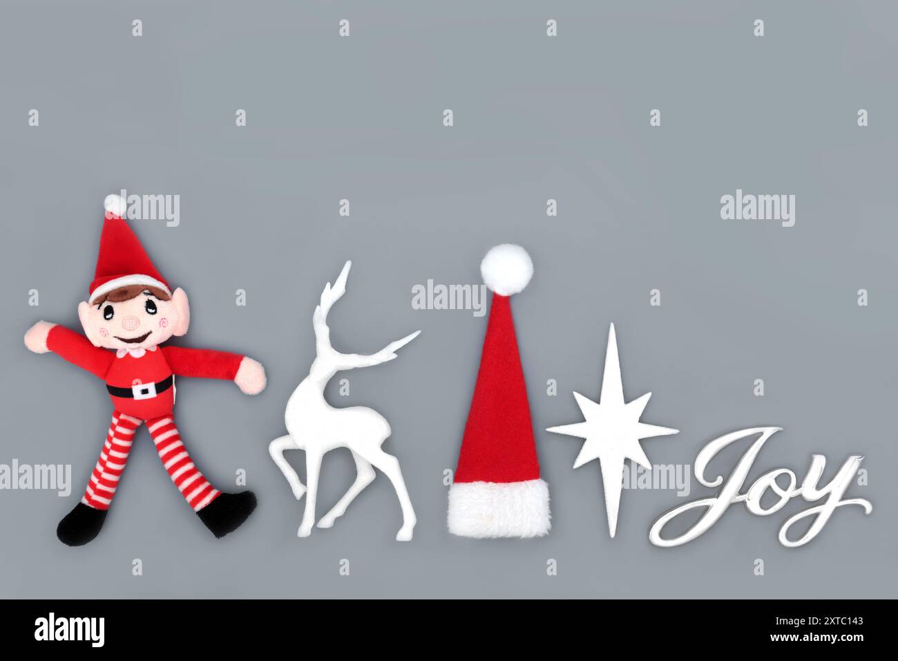 Christmas Eve Joy sign with festive bauble decorations on white ...