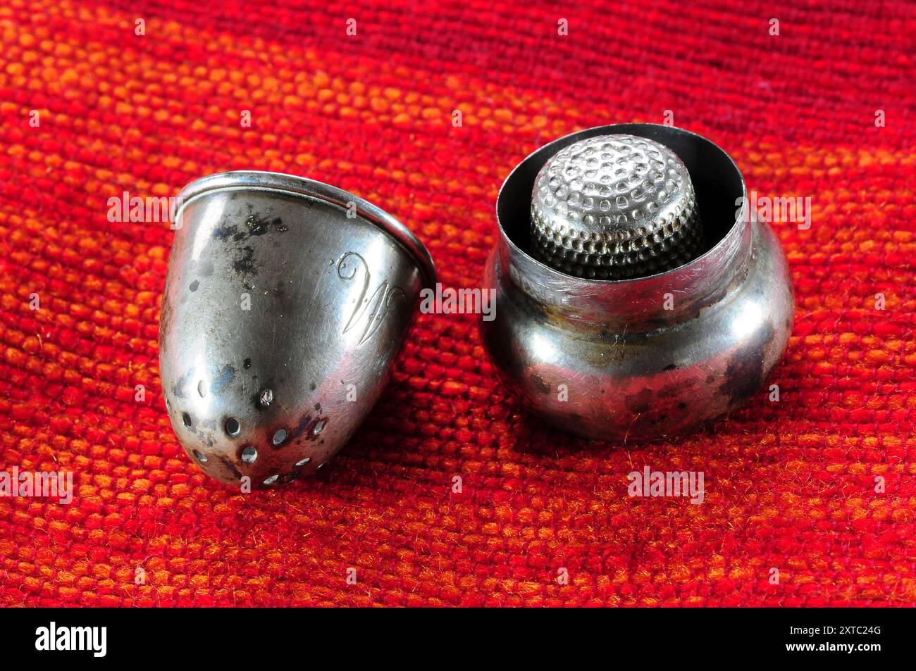Antique silver thimble in two part silver case Stock Photo - Alamy