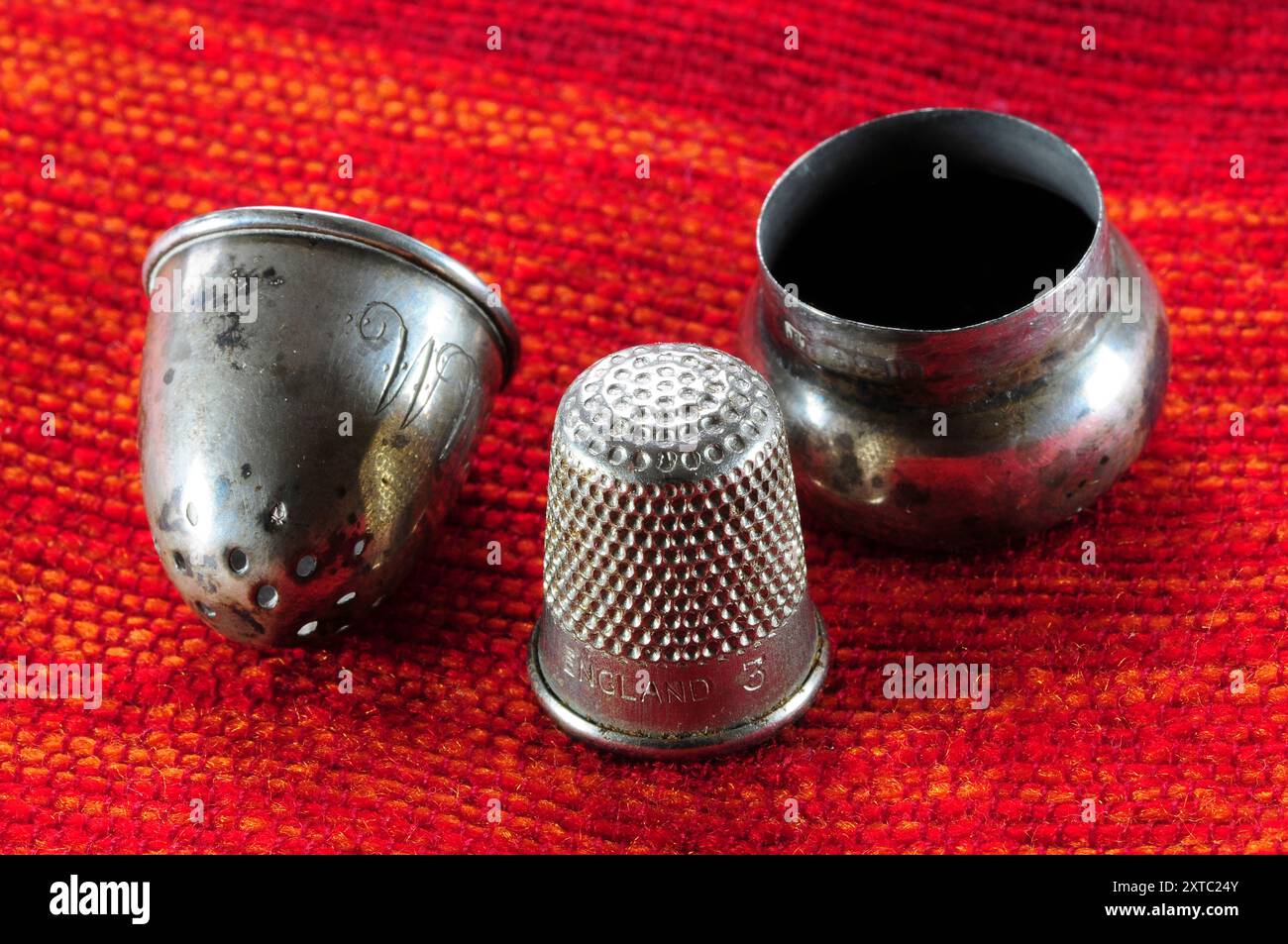 Antique silver thimble in two part silver case Stock Photo - Alamy