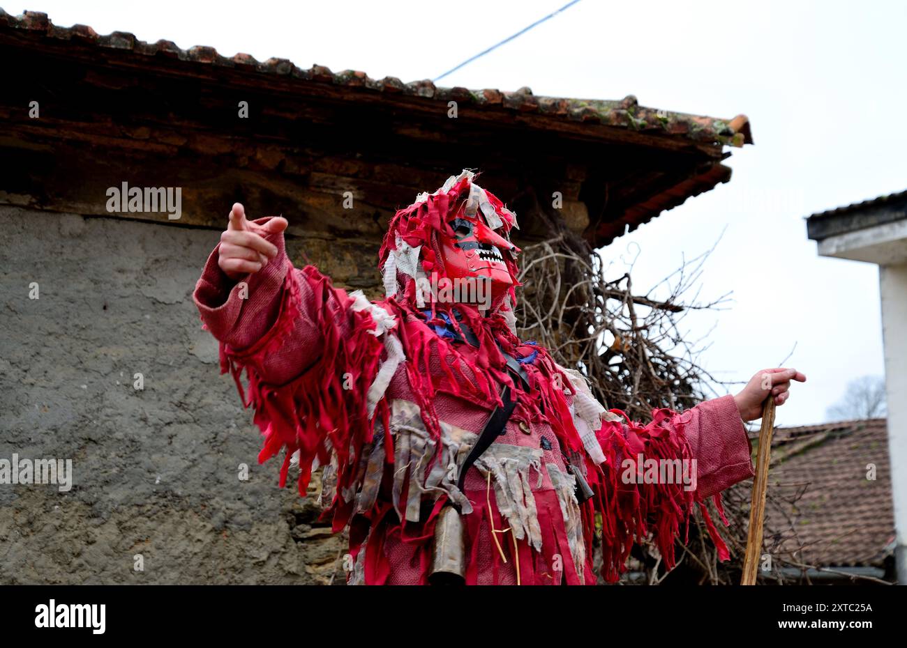 Caretos of Varge. Traditional mask of Varge, mountains close to ...