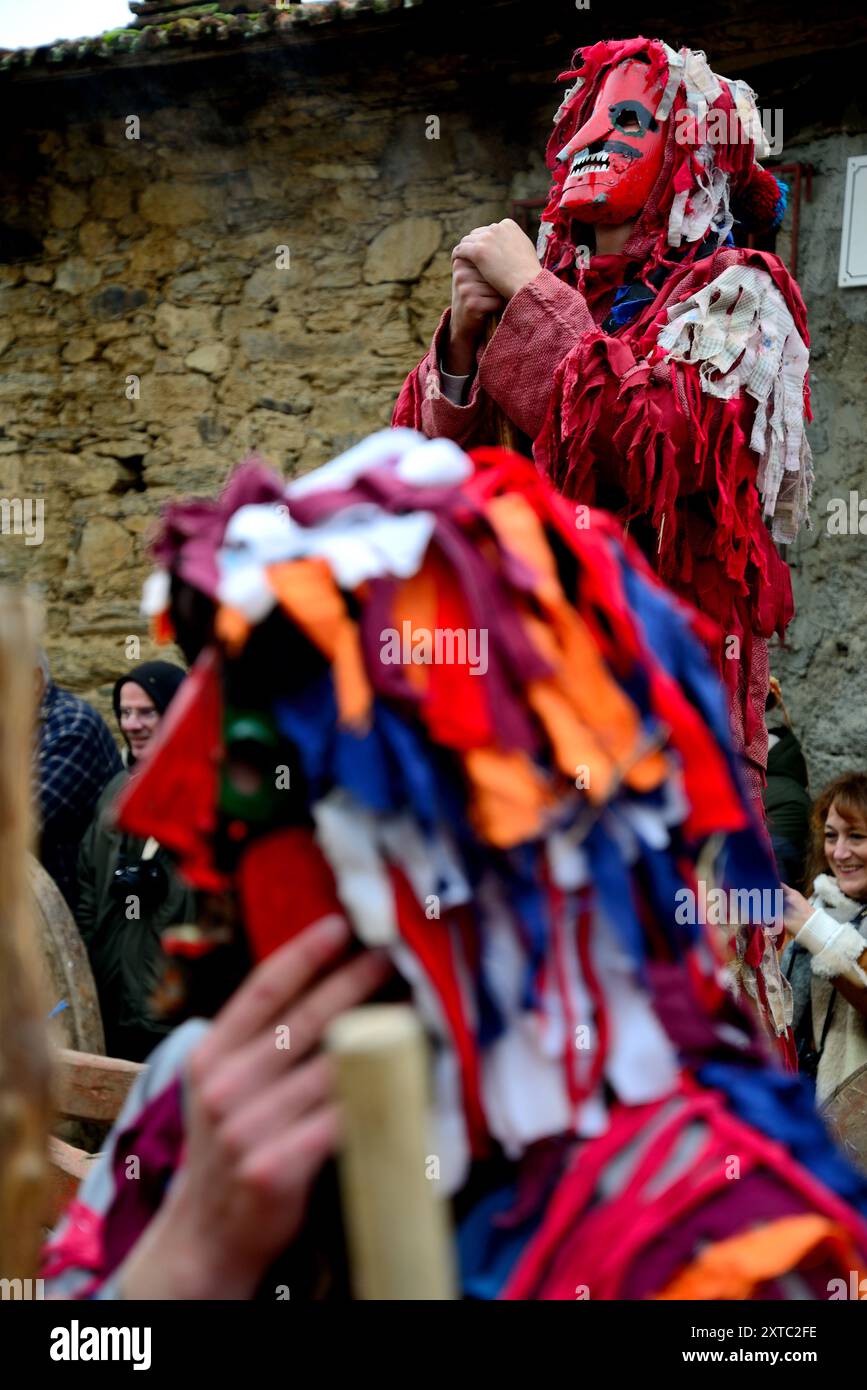 Caretos of Varge. Traditional mask of Varge, mountains close to ...