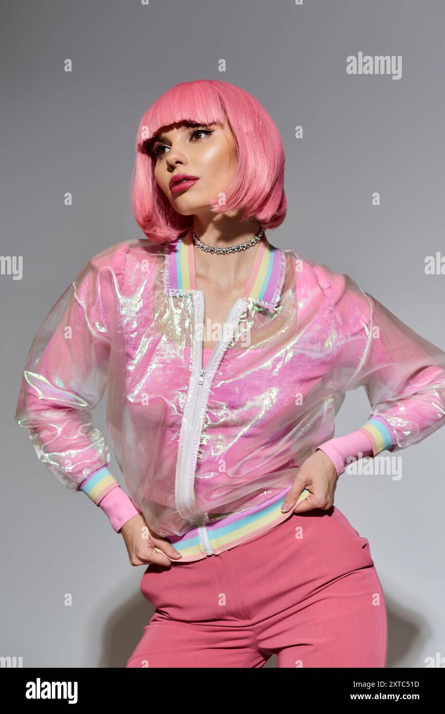 A woman with pink hair wears a transparent pink jacket with a rainbow ...
