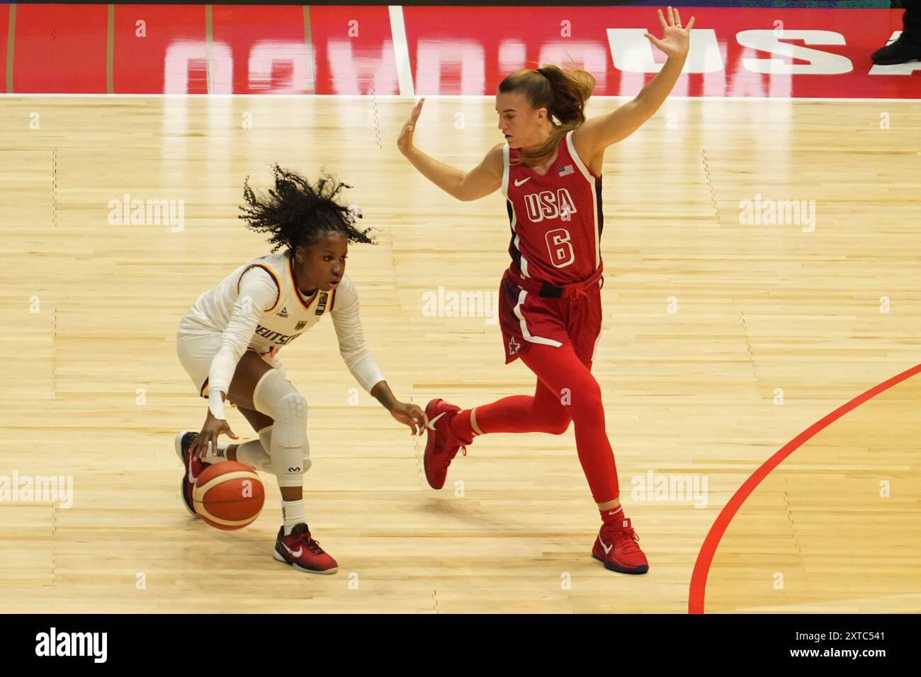 ALEXIS PETERSON OF TEAM GERMANY AND SABRINA IONESCU of TEAM USA during ...
