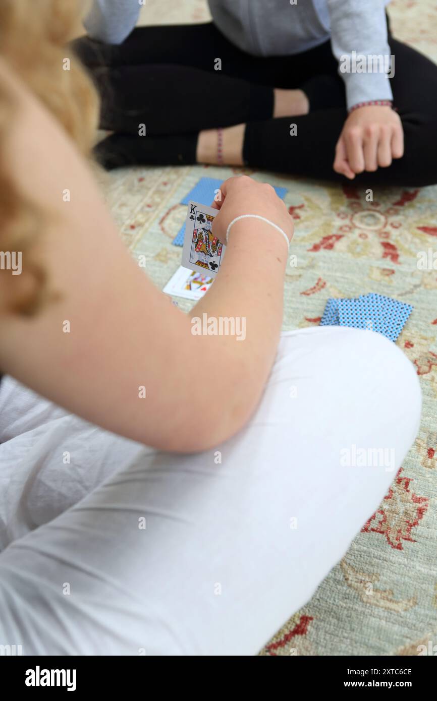 Two girls play card game - playing cards card games competition turn ...