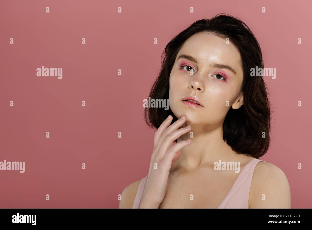 Woman poses against soft hi-res stock photography and images - Alamy