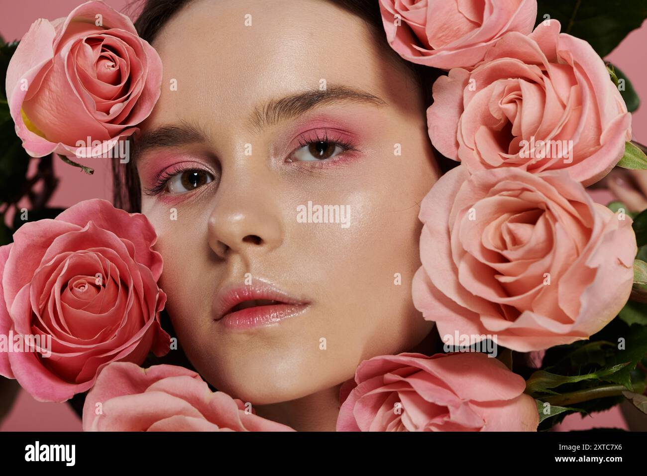 Young woman surrounded rose petals hi-res stock photography and images ...