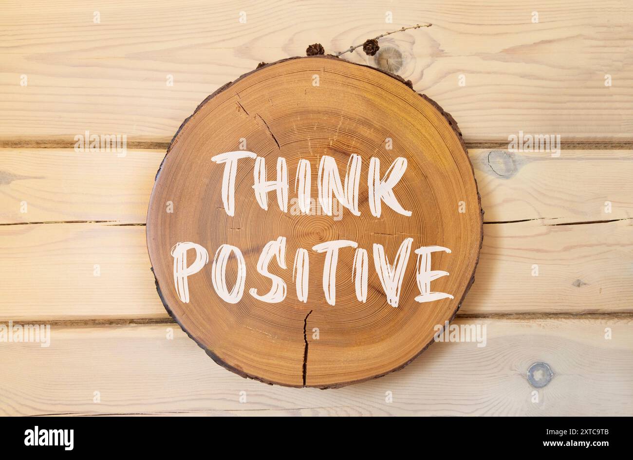 Think positive symbol. Concept words Think positive on beautiful wooden ...