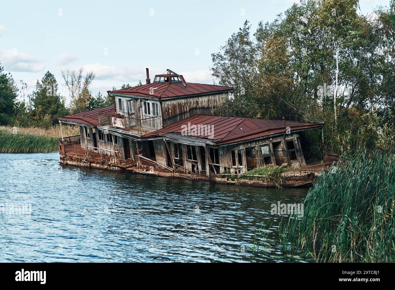 Abandoned floating boat restaurant in the harbour of ghost town Pripyat ...