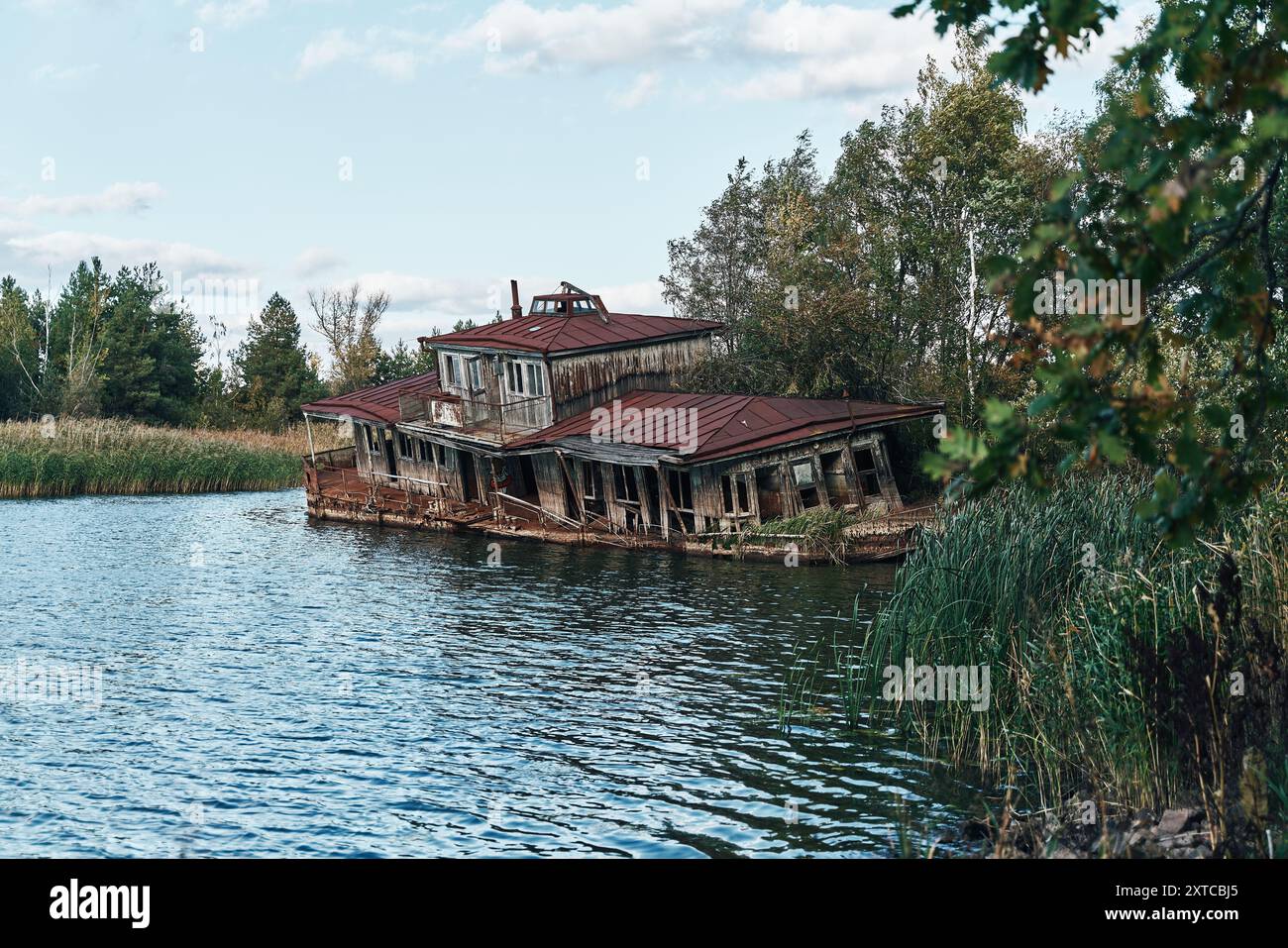 Abandoned floating boat restaurant in the harbour of ghost town Pripyat ...