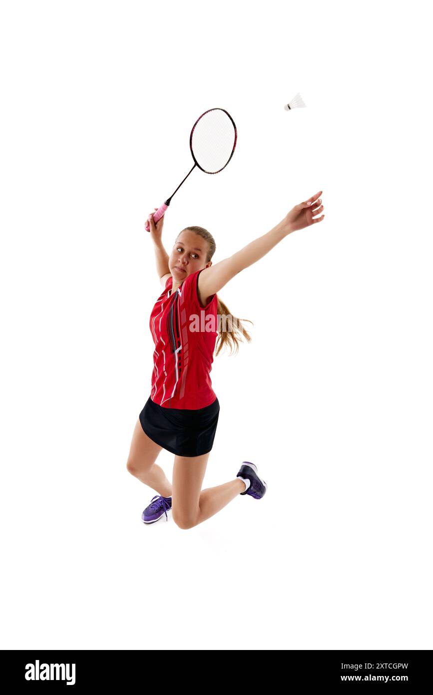 Professional badminton athlete hitting shuttlecock, during training ...
