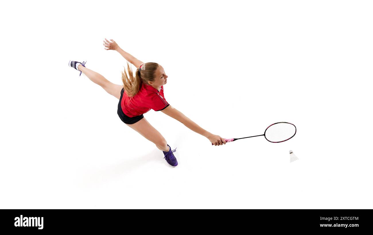 aerial view of female badminton player jumping in motion to hit ...