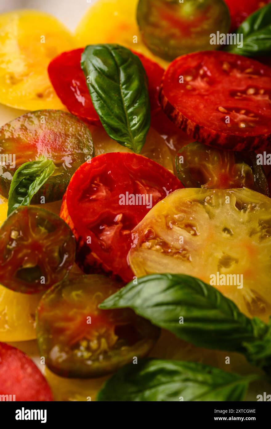 Different sort of sliced ripe tomatoes Stock Photo - Alamy