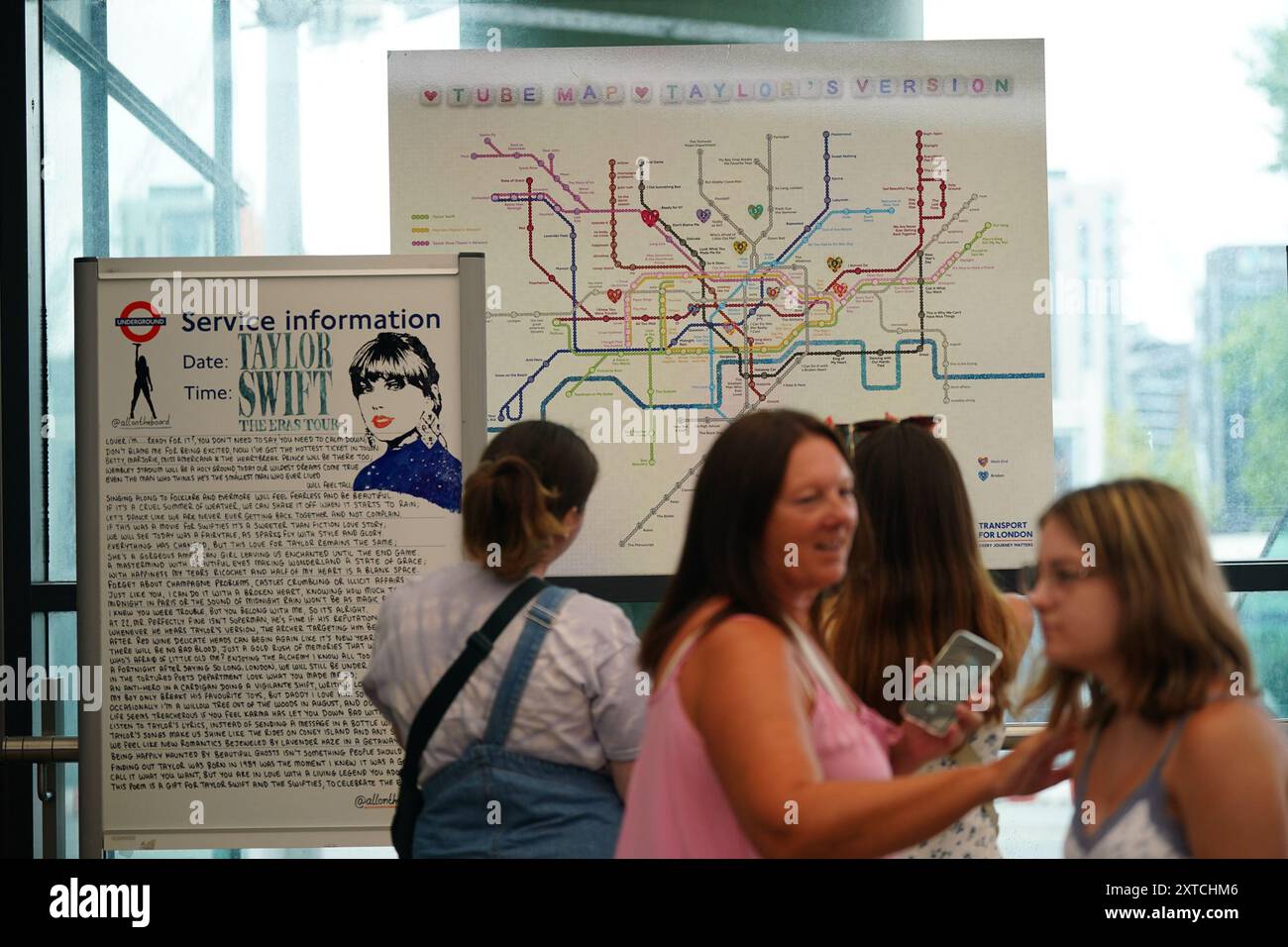 People take photographs of a Taylor Swift, @allontheboard service ...