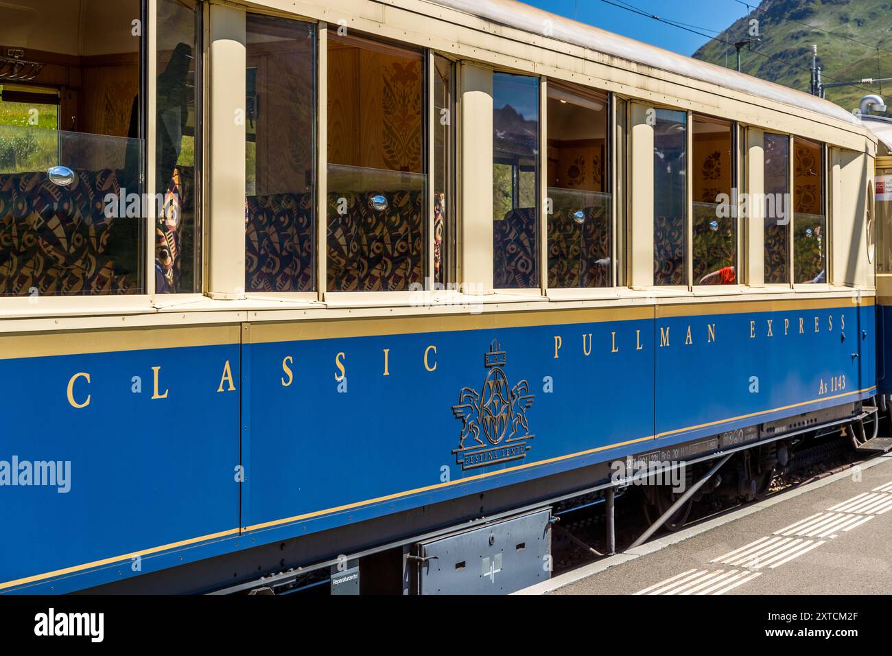 Blue and white Alpine Classic Pullman Express wagon on a nostalgic ...