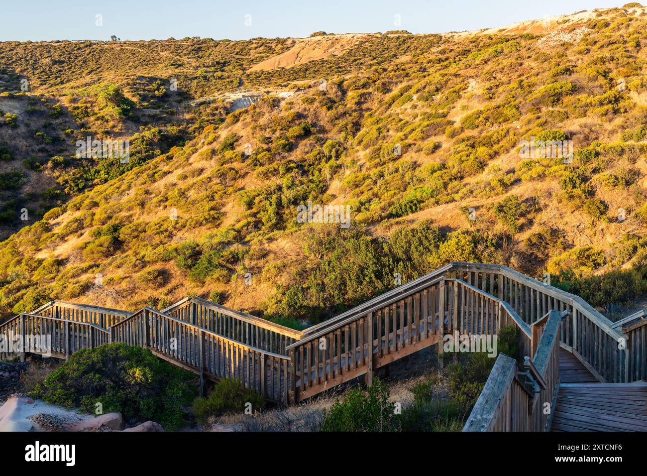 Hallett Cove boardwalk around the iconic Sugarloaf mountain at sunset ...