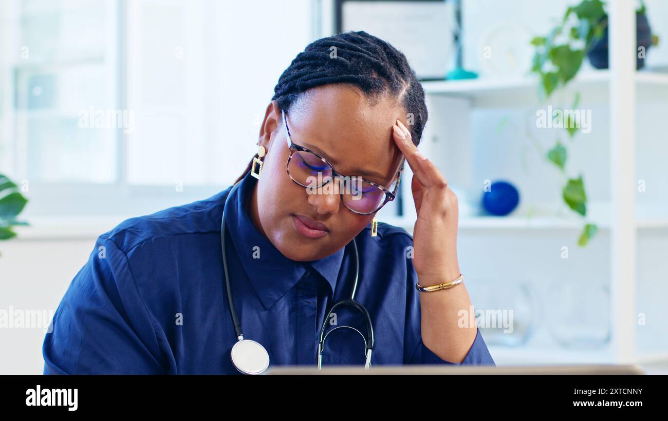 Stressed Doctor in Office with Glasses and Stethoscope Feeling Headache ...