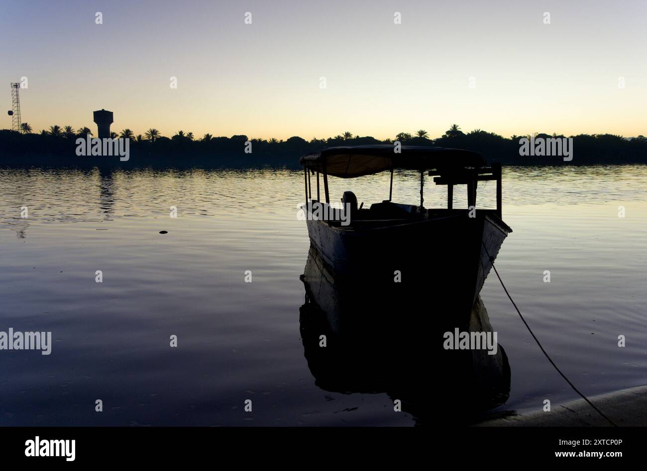 Passenger boat by shore at evening in Vatomandry, Madagascar Stock ...