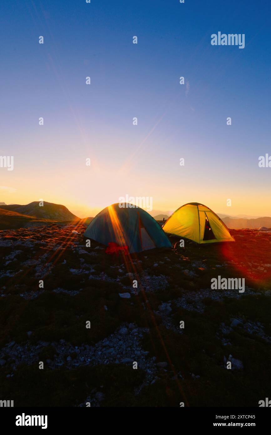 Stunning picture of camping in the alps with clear view of the sunset ...