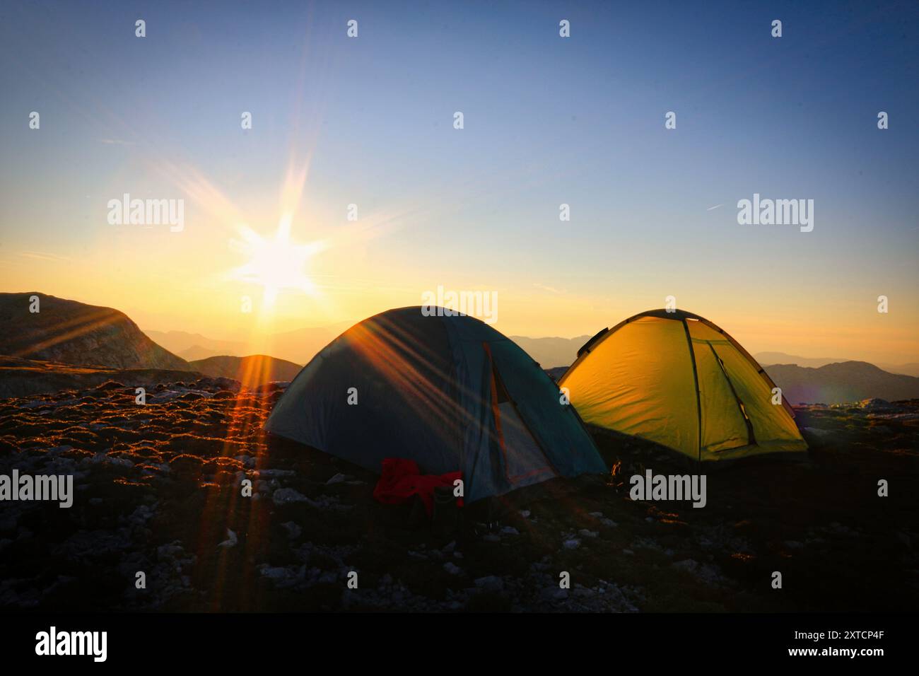 Stunning picture of camping in the alps with clear view of the sunset ...