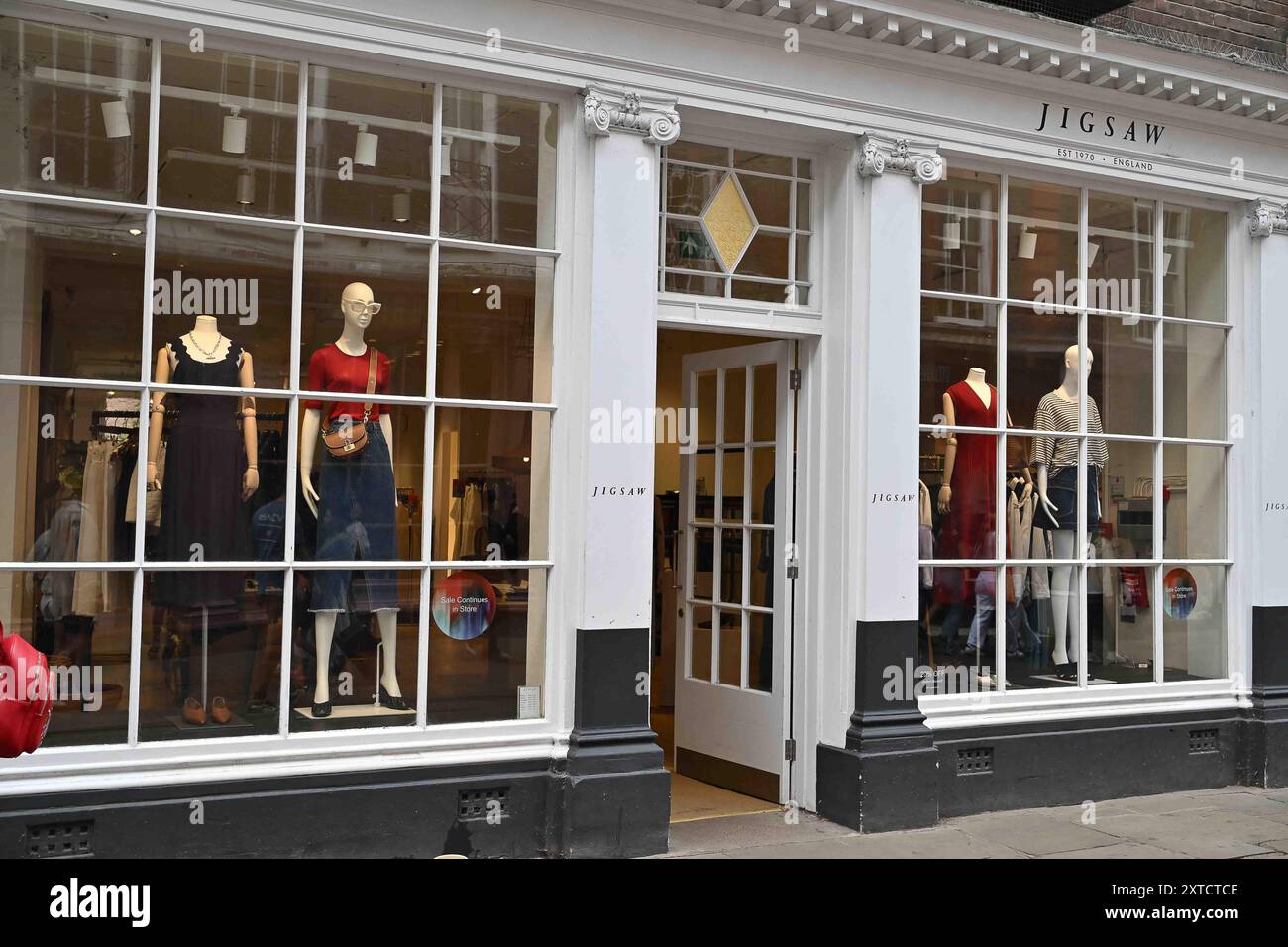 04-August-2024, Cambridge, England, Exterior building and shop window ...