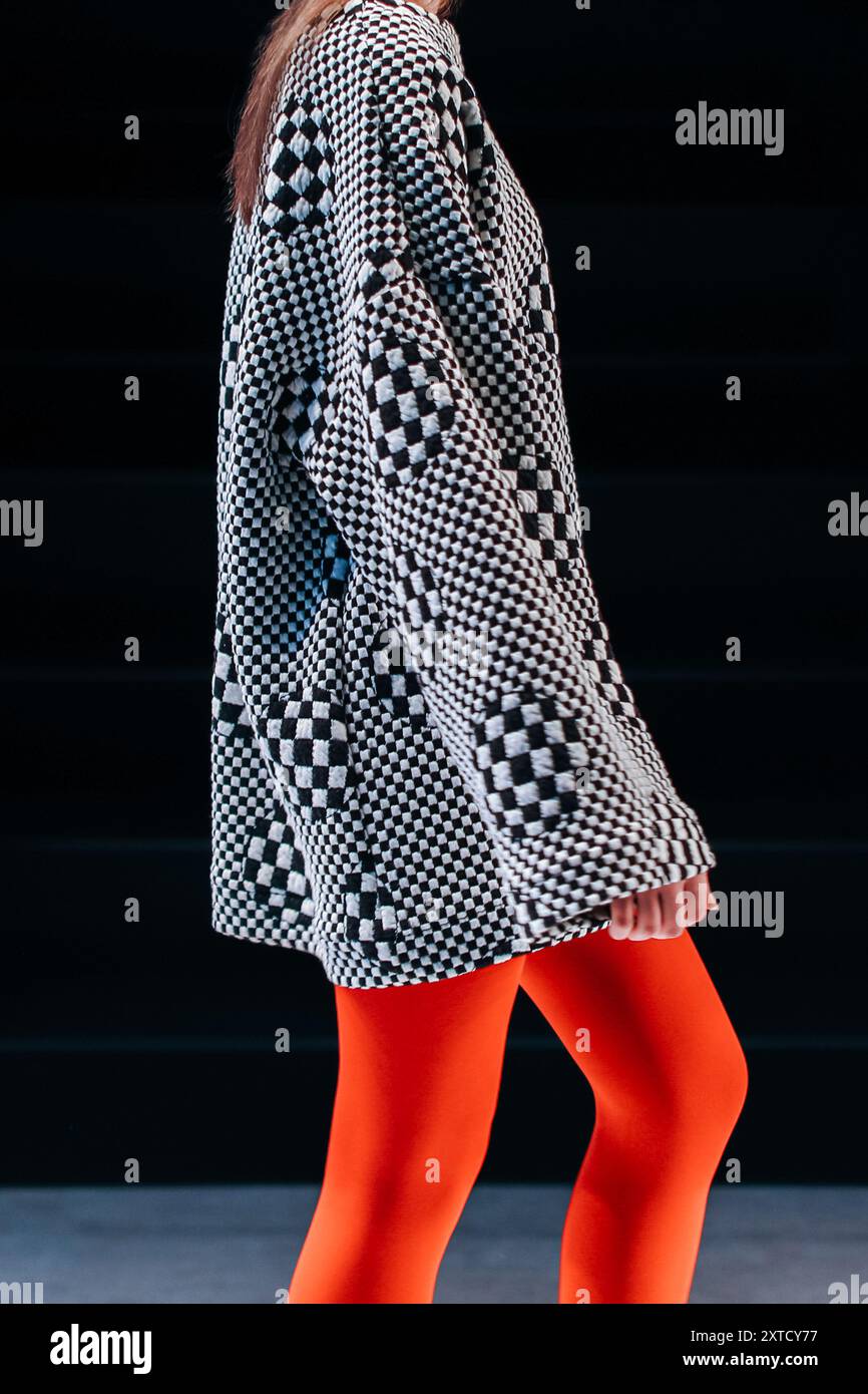 Black and white checkered dress on a female figure, red tights, fancy ...