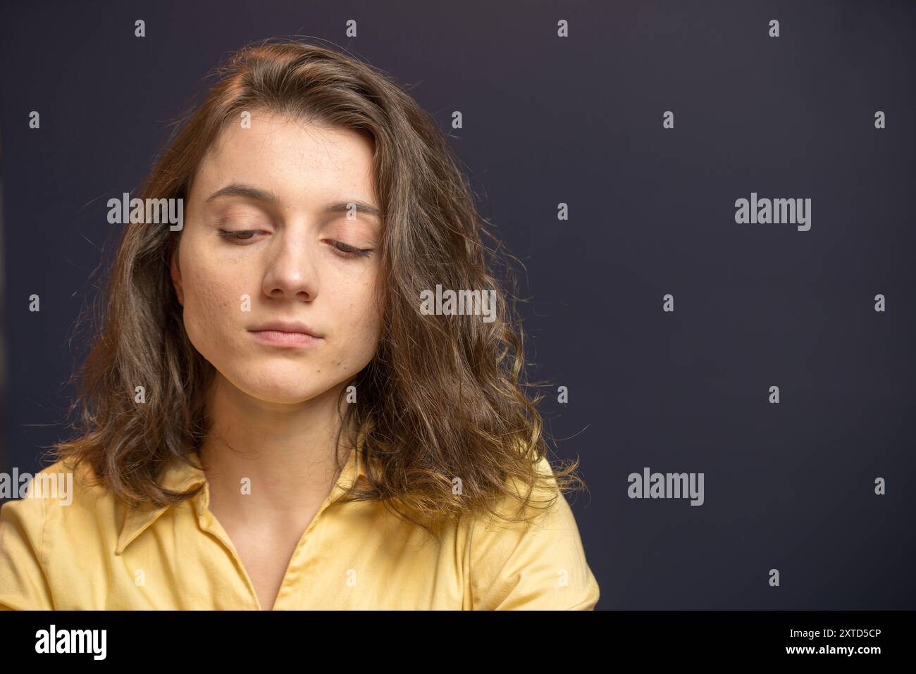 Woman looking at photograph sad hi-res stock photography and images - Alamy