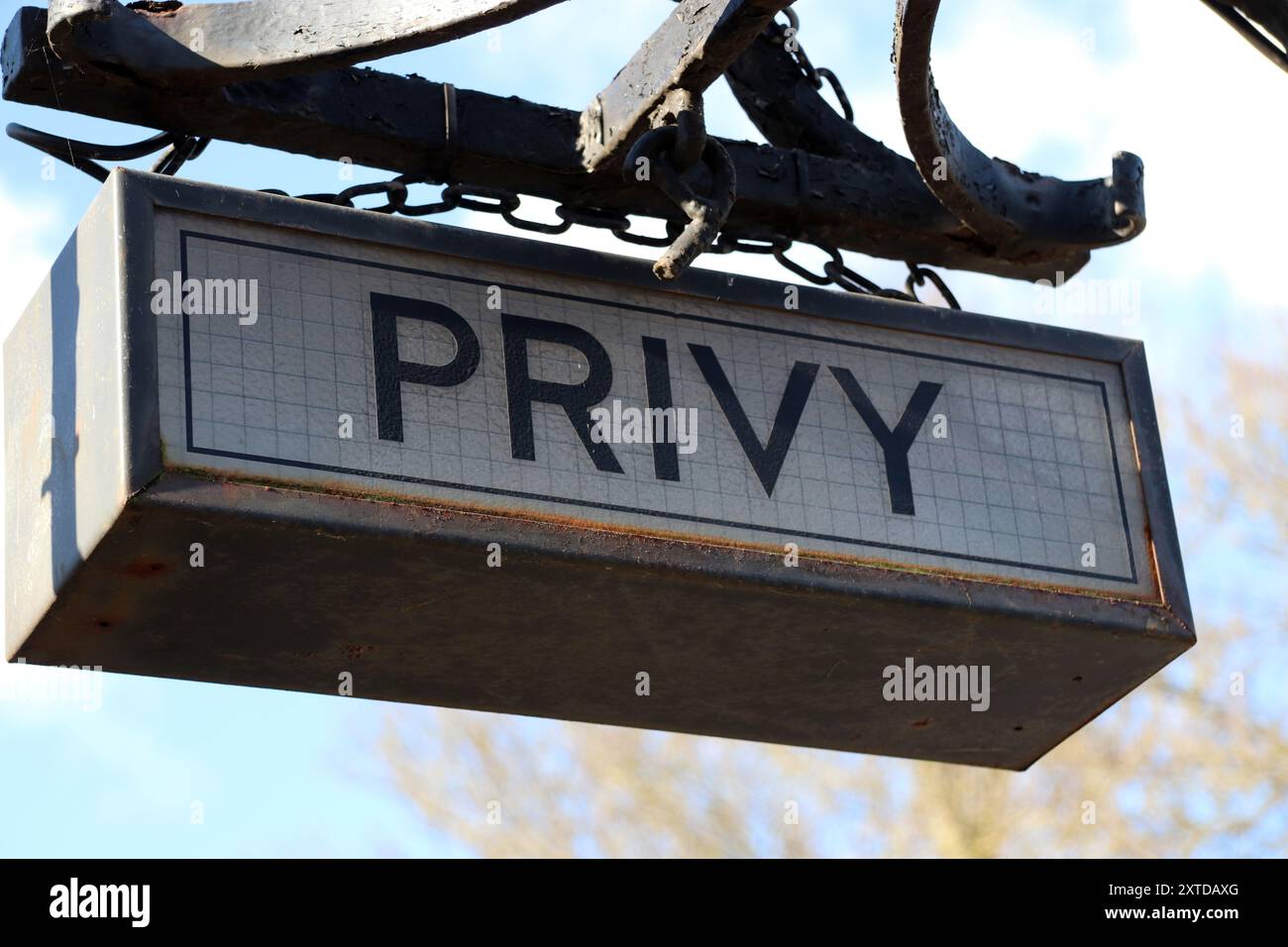 Privy sign above public toilet entrance Stock Photo - Alamy