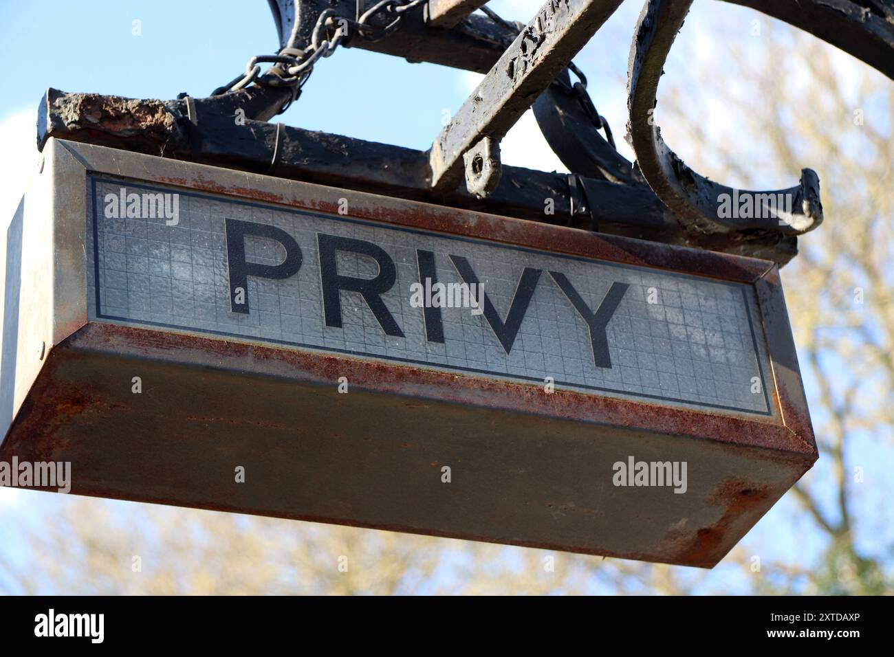 Privy sign above public toilet entrance Stock Photo - Alamy