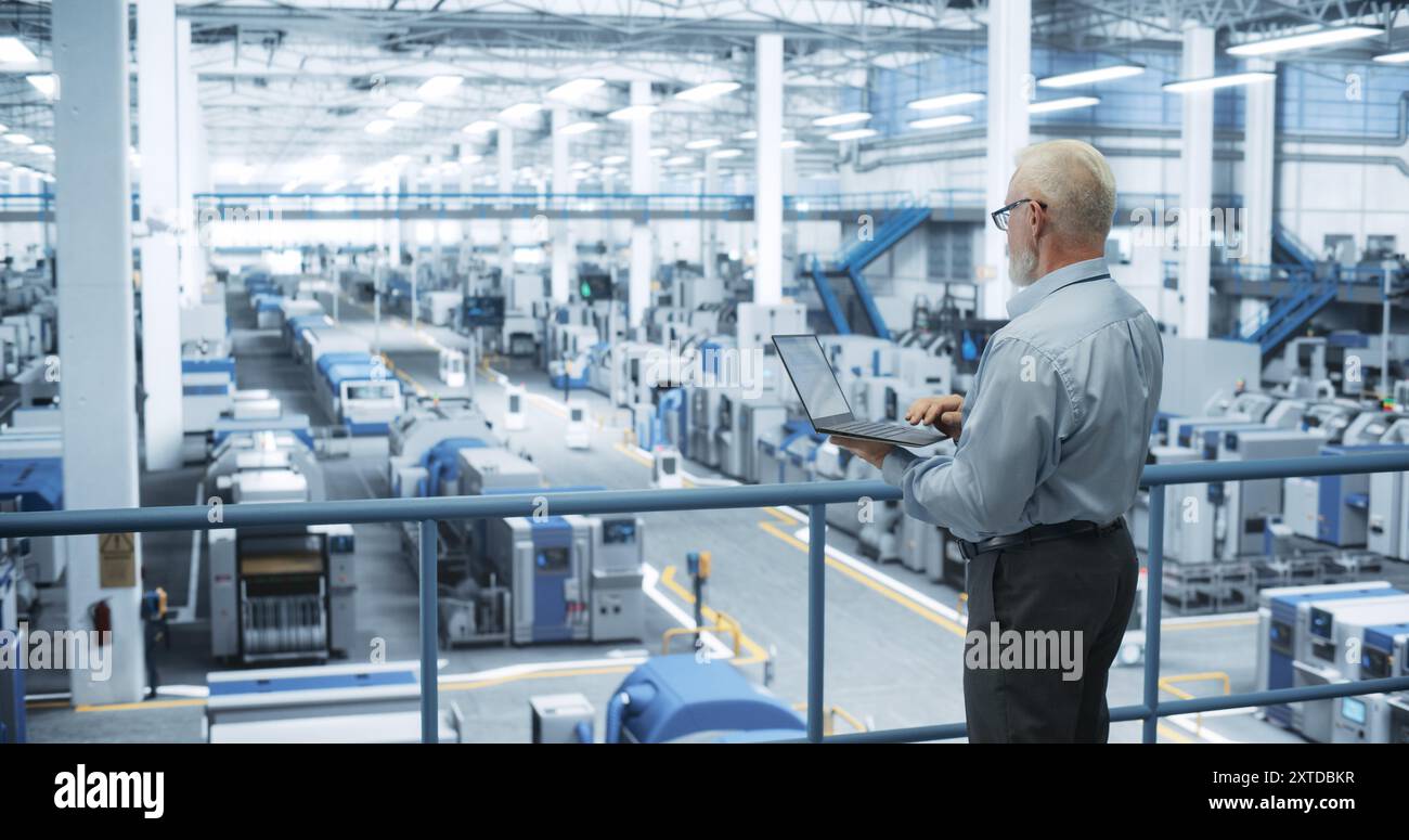 Thoughtful Middle Aged Engineer Monitoring and Analyzing Conditions at ...