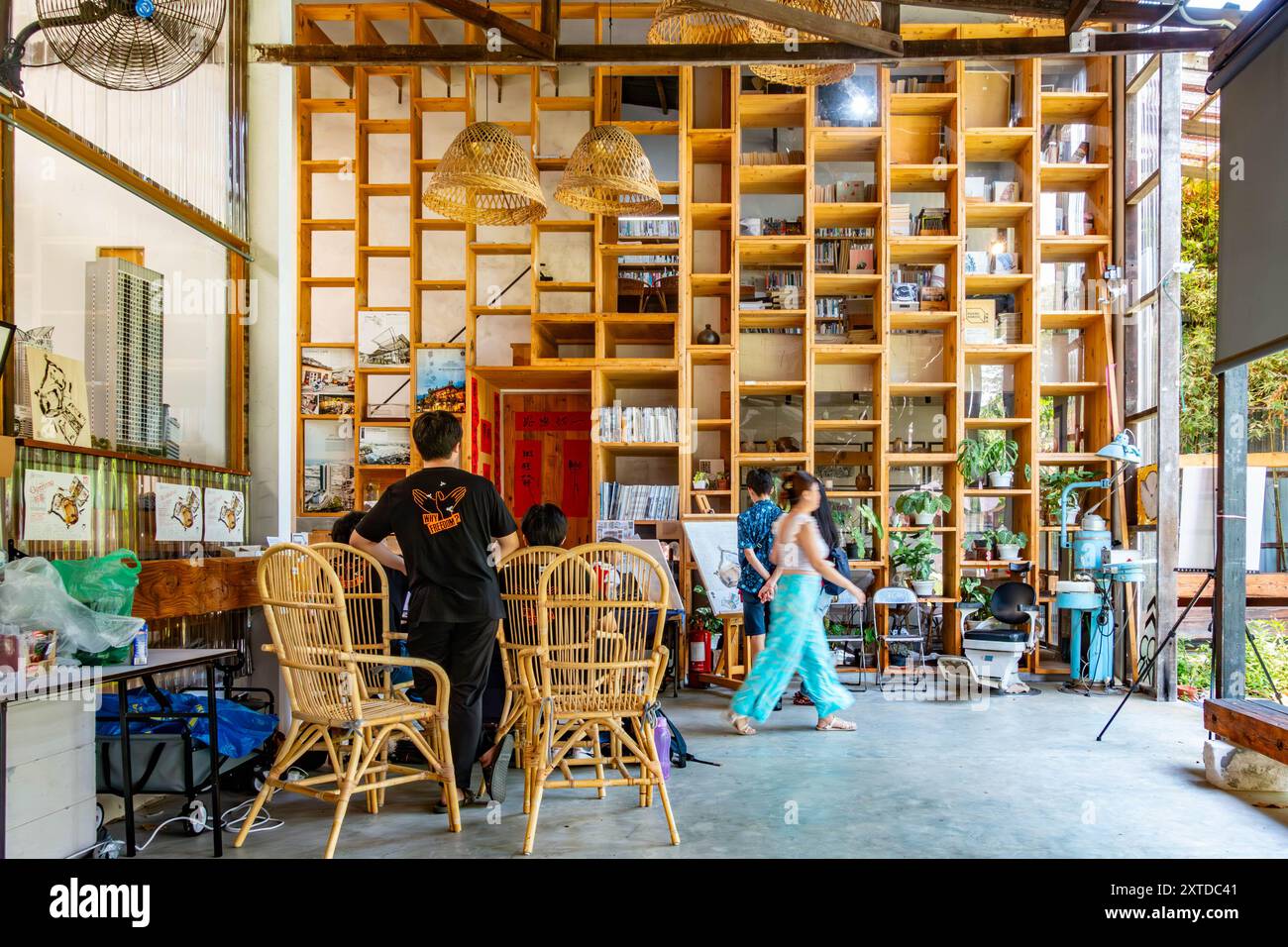A large wooden bookcase is a dominating feature of an area attached to the old Hin Bus Depot in ...