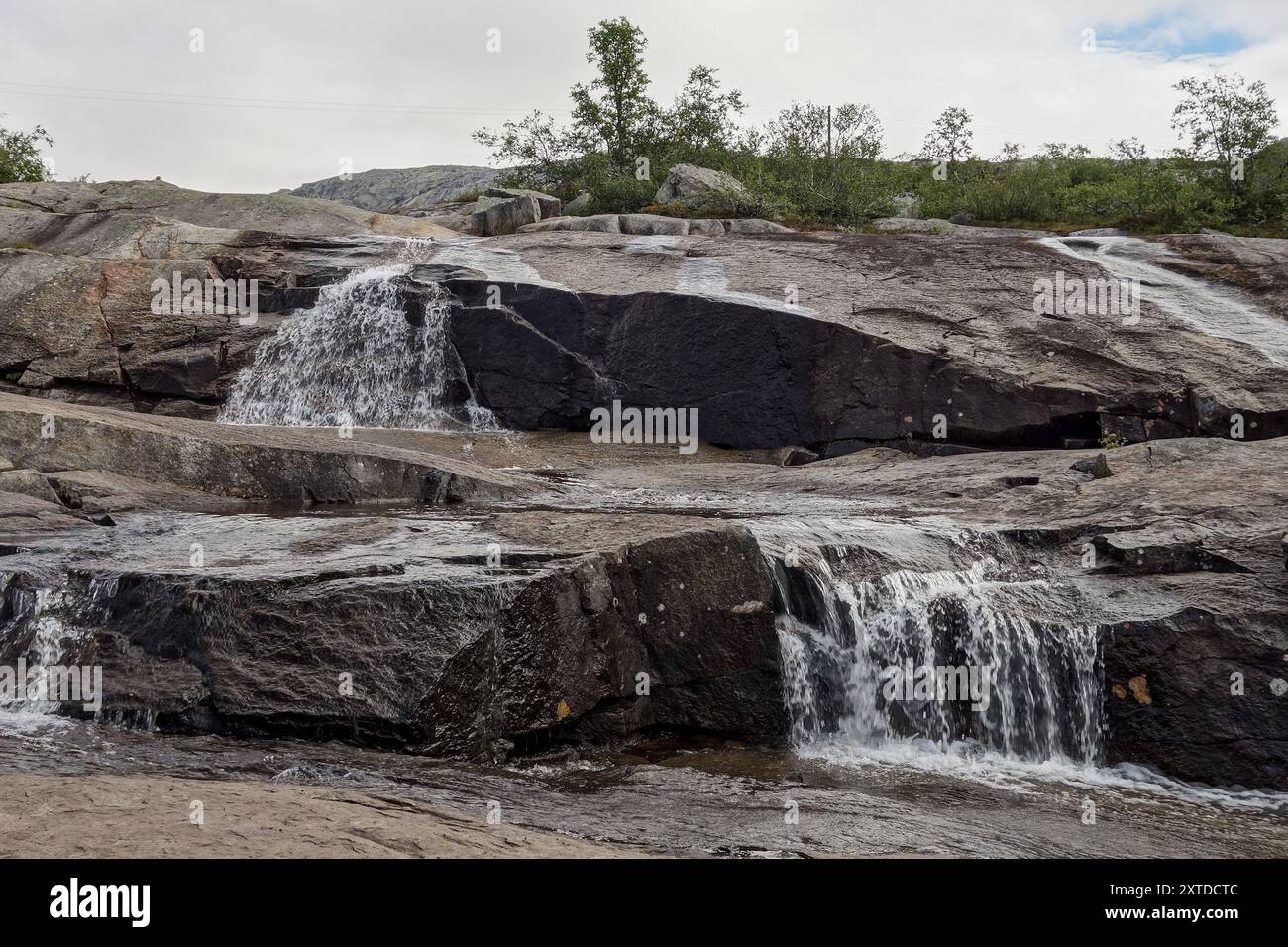 Small waterfalls and stone rocks on trail to Trolltunga, Norway Stock ...
