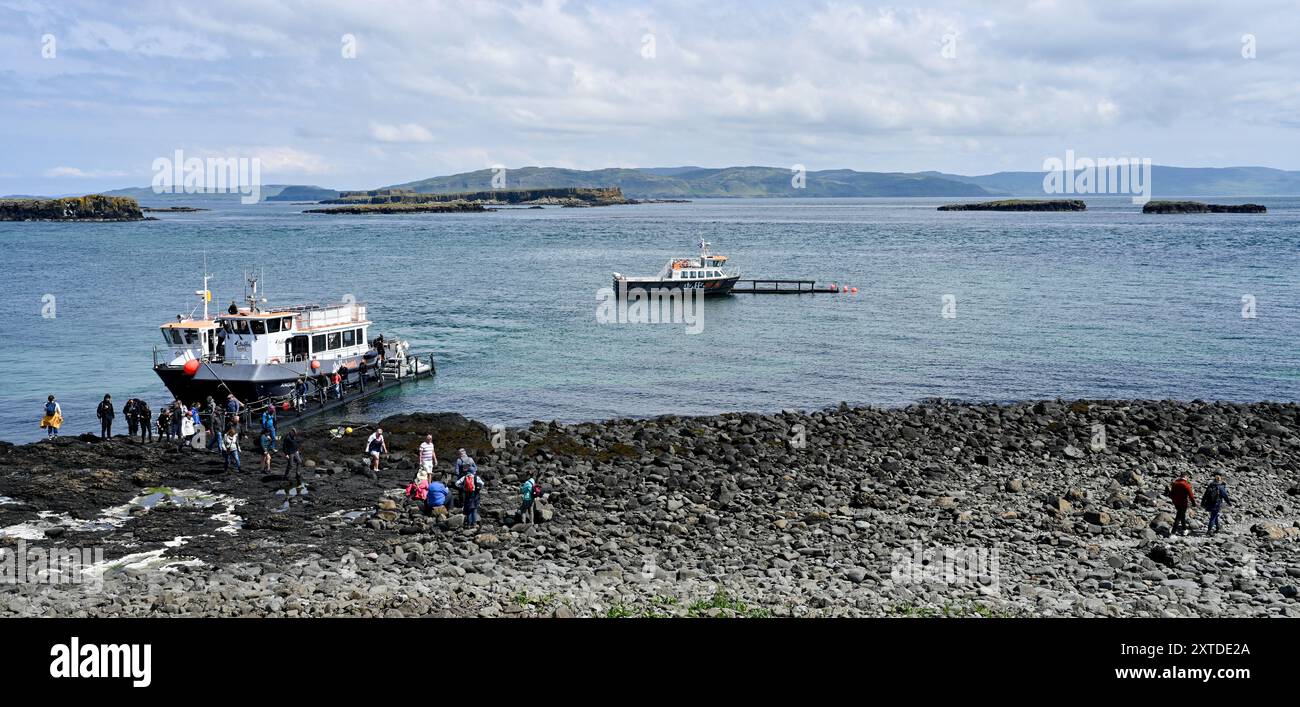 Lunga, Treshnish Isles. Tour boats landing on the islands to see the ...