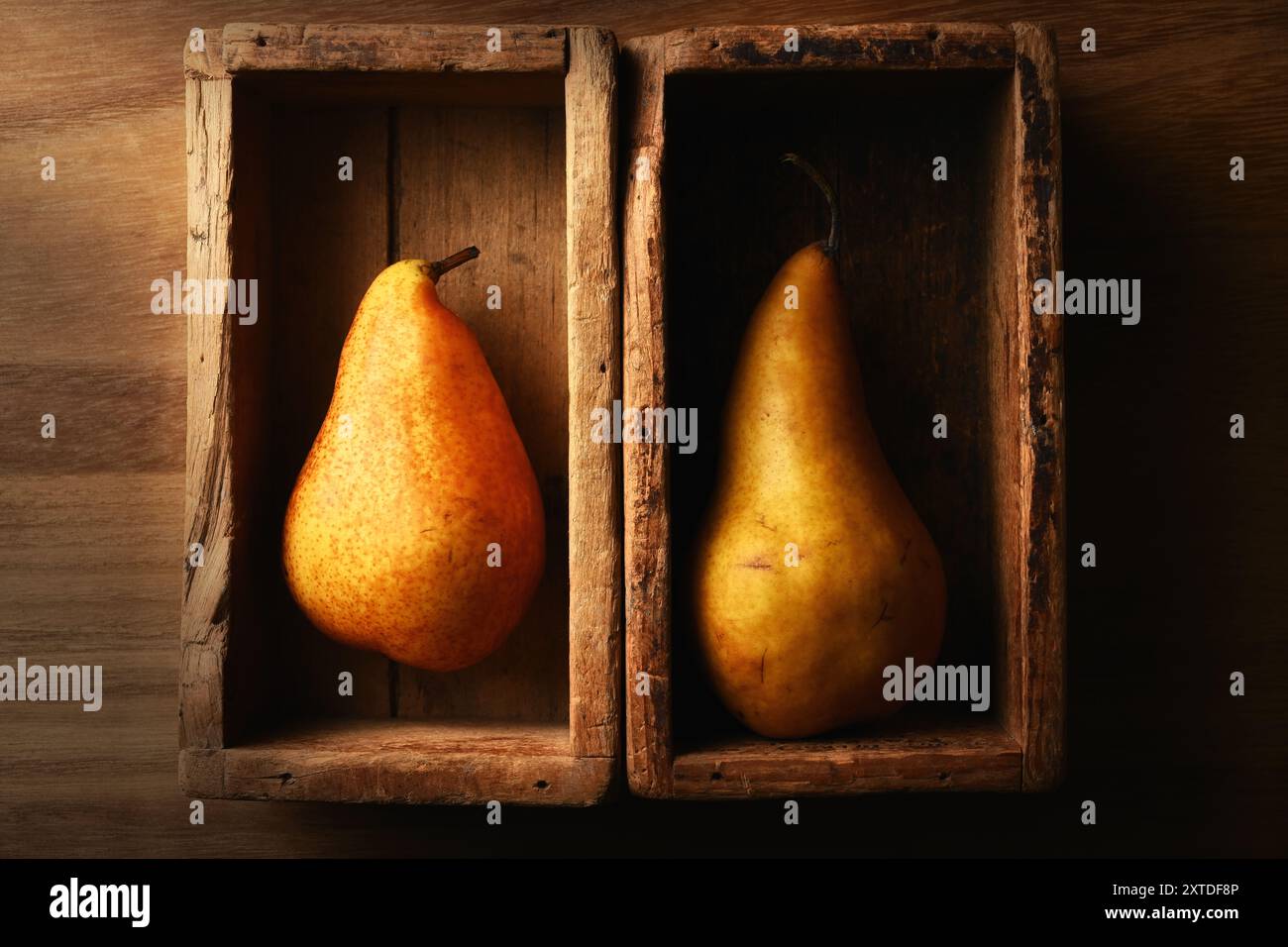 Two Pears in Wooden boxes Stock Photo - Alamy