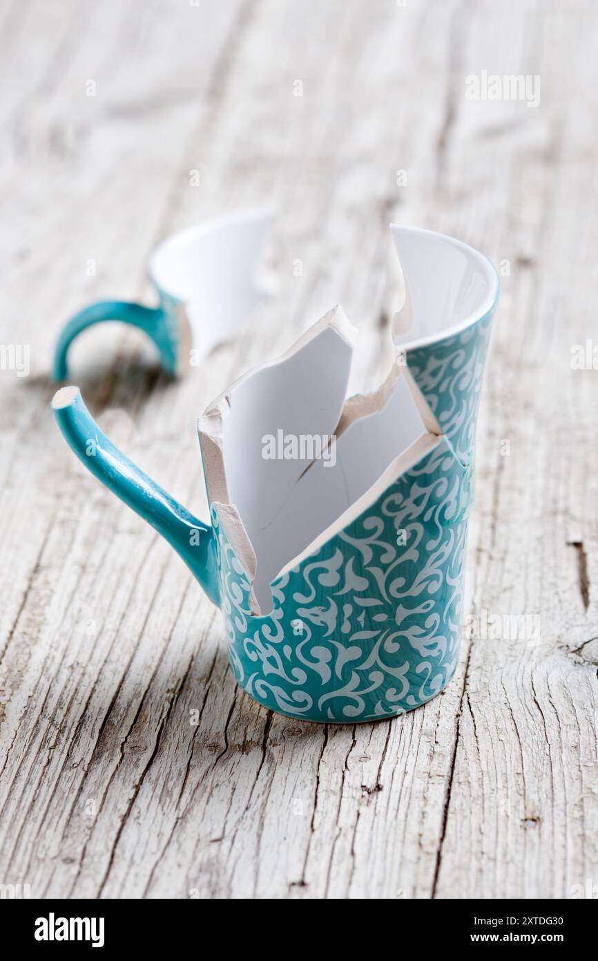 porcelain cup broken into pieces and stuck again Stock Photo - Alamy