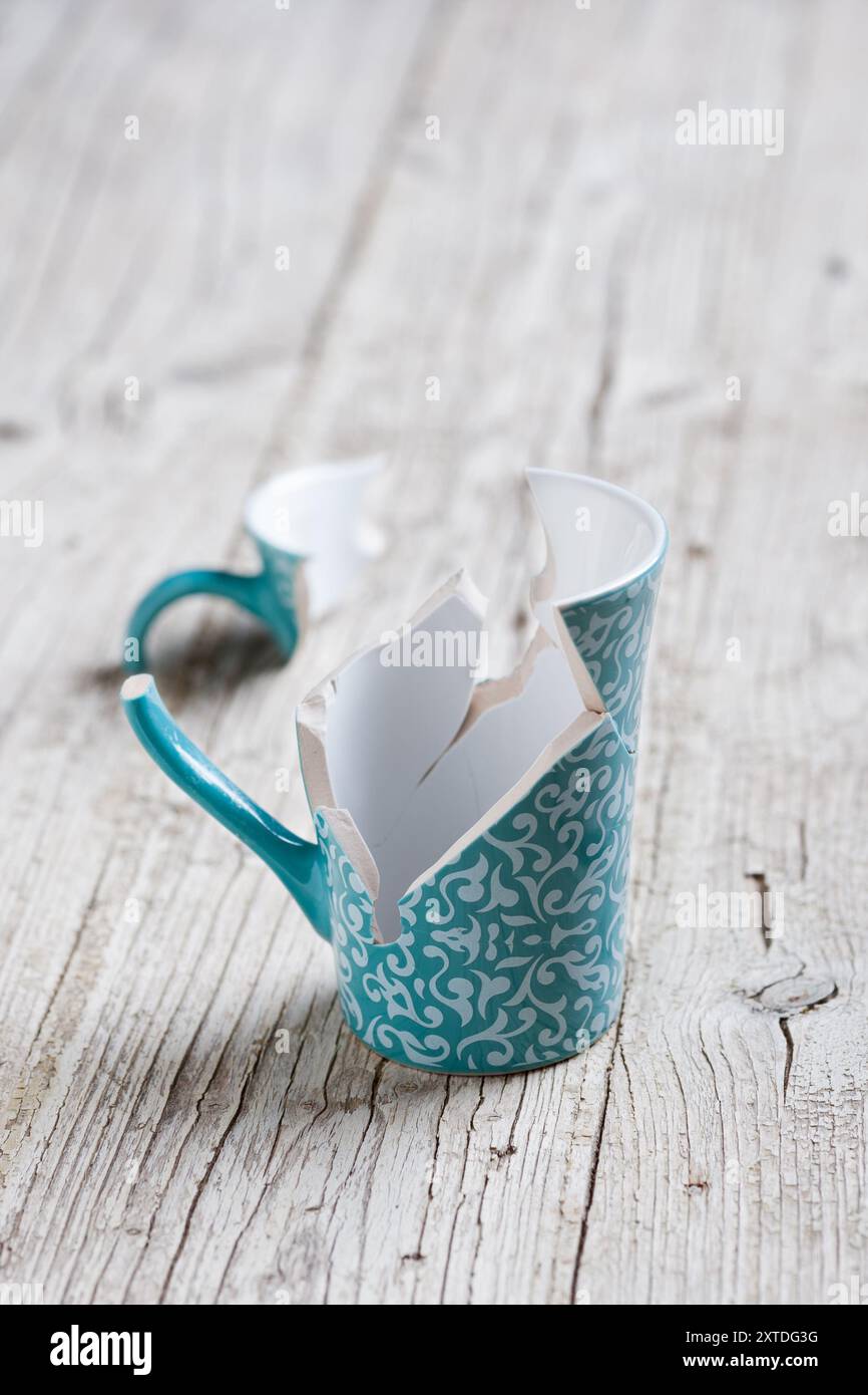 porcelain cup broken into pieces and stuck again Stock Photo - Alamy
