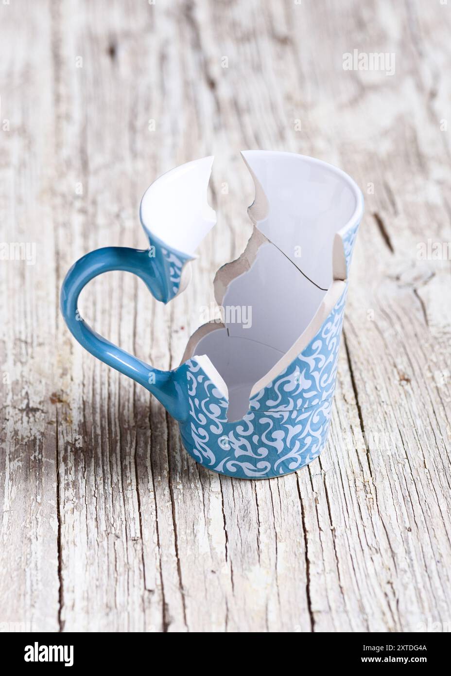 porcelain cup broken into pieces and stuck again Stock Photo - Alamy