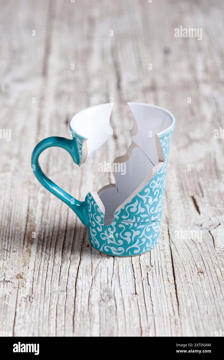 porcelain cup broken into pieces and stuck again Stock Photo - Alamy
