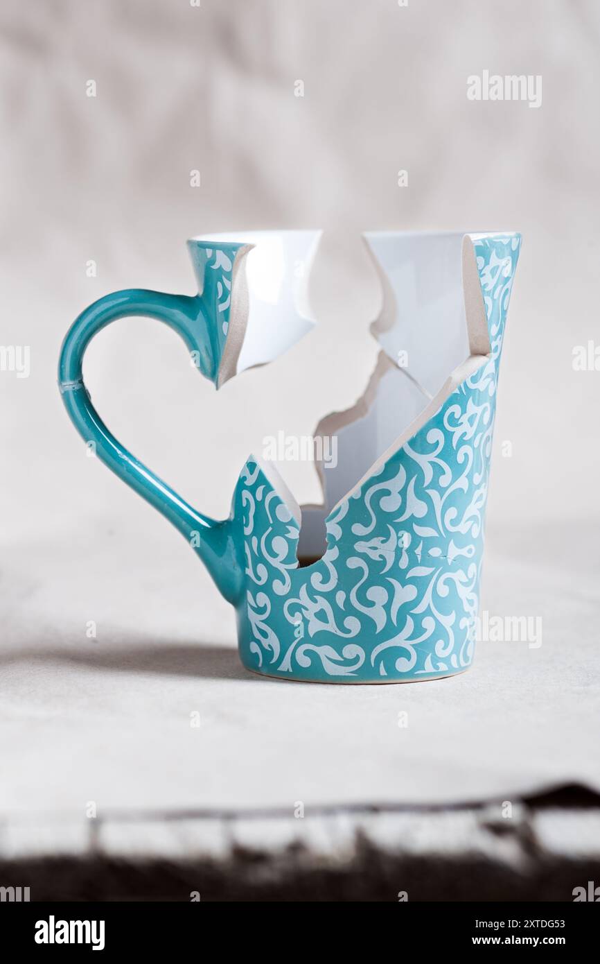 porcelain cup broken into pieces and stuck again Stock Photo - Alamy
